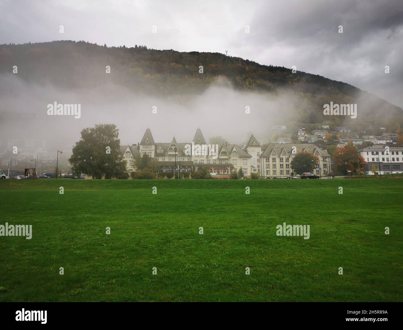 VOSS, NORWAY - Oct 09, 2021: The foggy Voss town buildings with smooth ...