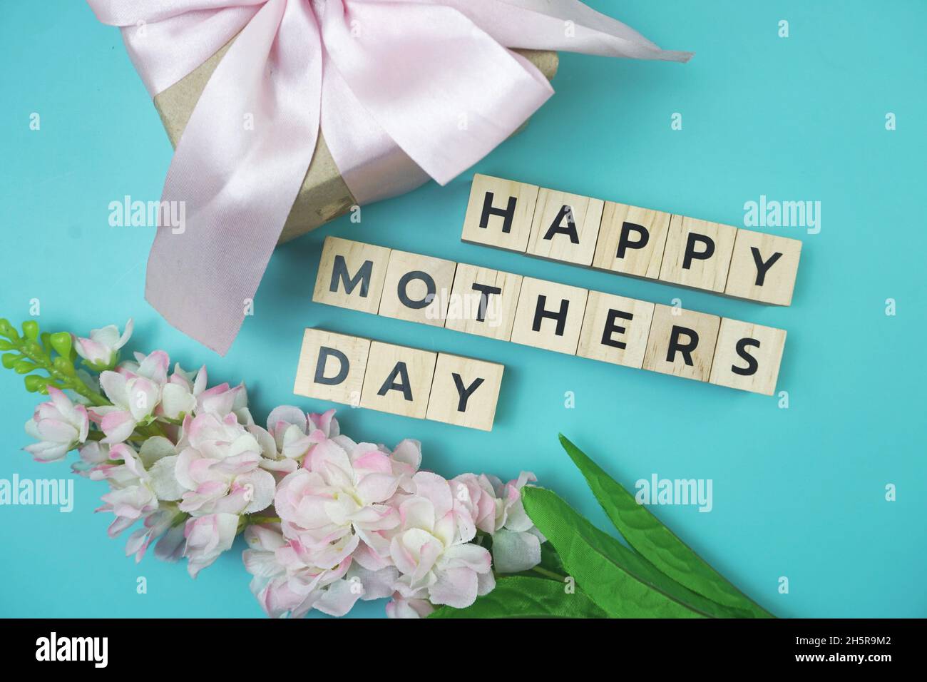 Happy Mothers day alphabet letter on blue background Stock Photo - Alamy