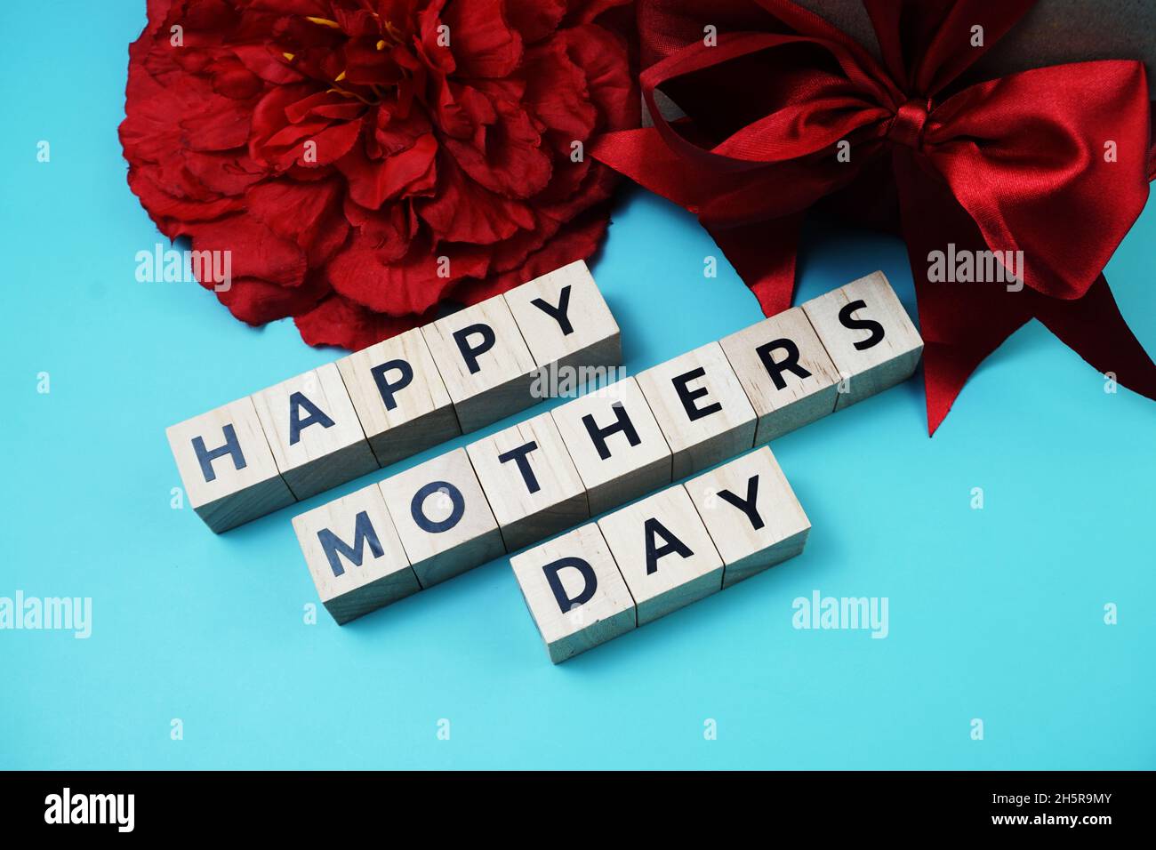 Happy Mothers day alphabet letter with gift box and red flower ...