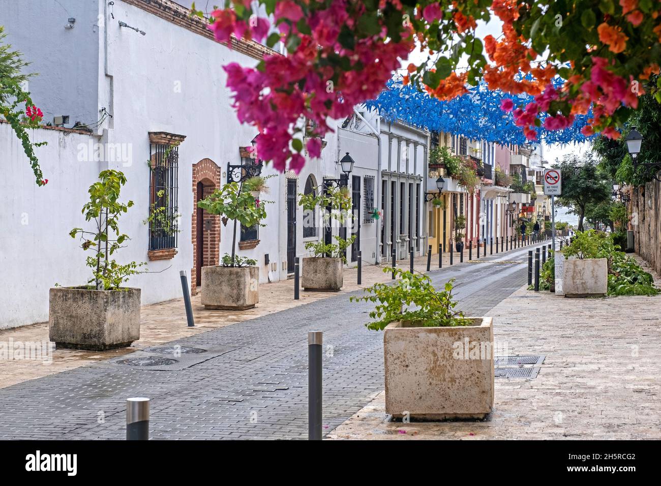 Street in Ciudad Colonial, Spanish historic neighborhood in the city ...