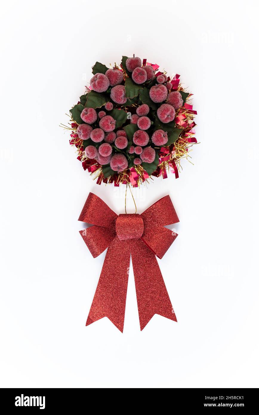 Beautiful red bow gift with holly leaf wreath christmas decoration ...
