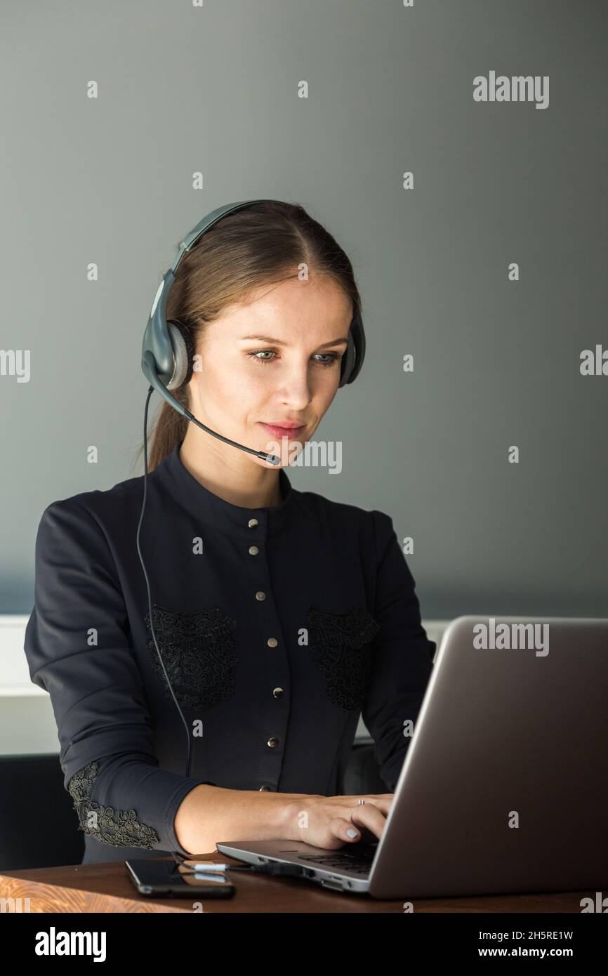Portrait of woman customer service worker, call center smiling operator with phone on office ...