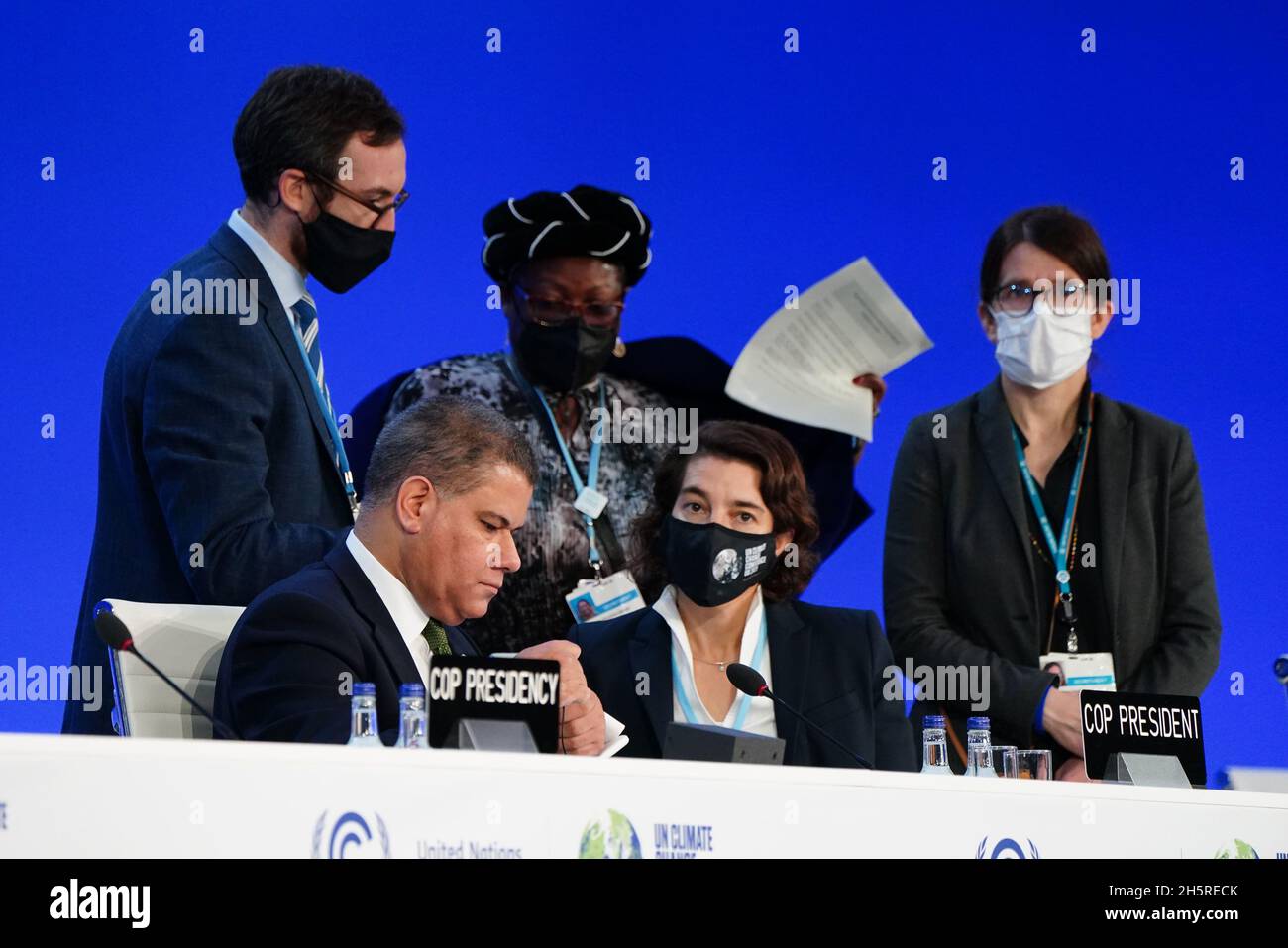 Cop 26 President Alok Sharma surrounded by advisers before giving his ...