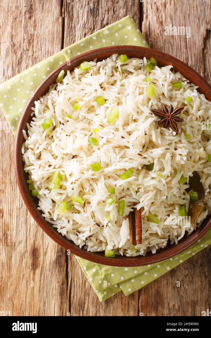 Perfect Jeera Rice Indian Cumin Rice close up in the bowl on the table ...