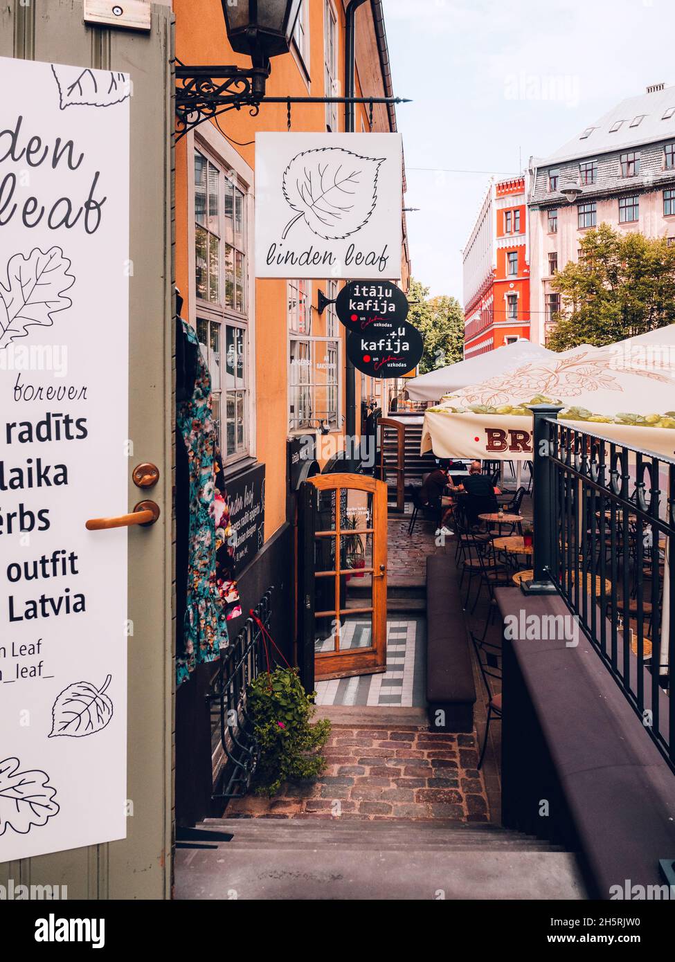 Many shop signs in a row Stock Photo - Alamy
