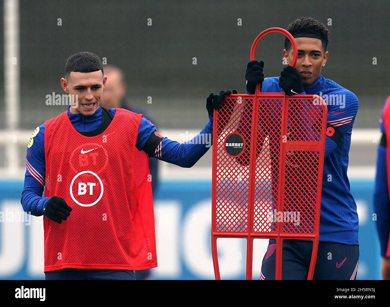England's Jude Bellingham and Phil Foden (left) during a training ...