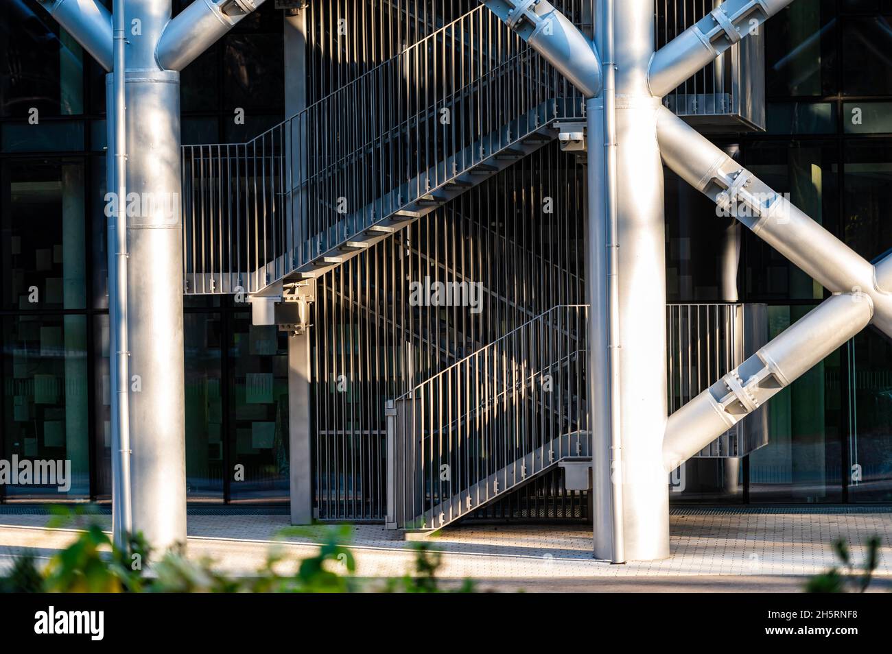 stairs with metal steps and railings leading upwards, an element of ...