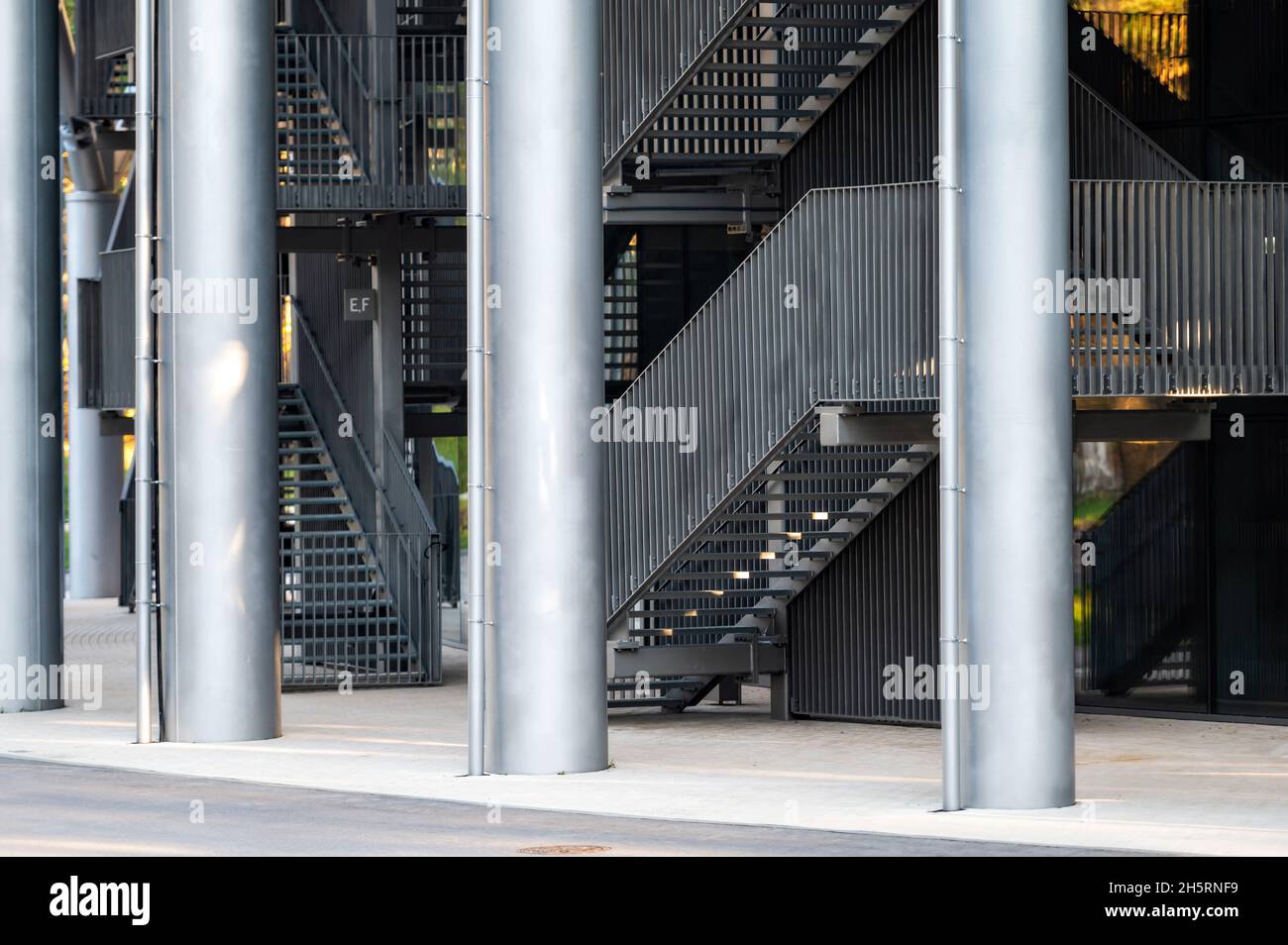 stairs with metal steps and railings leading upwards, an element of ...