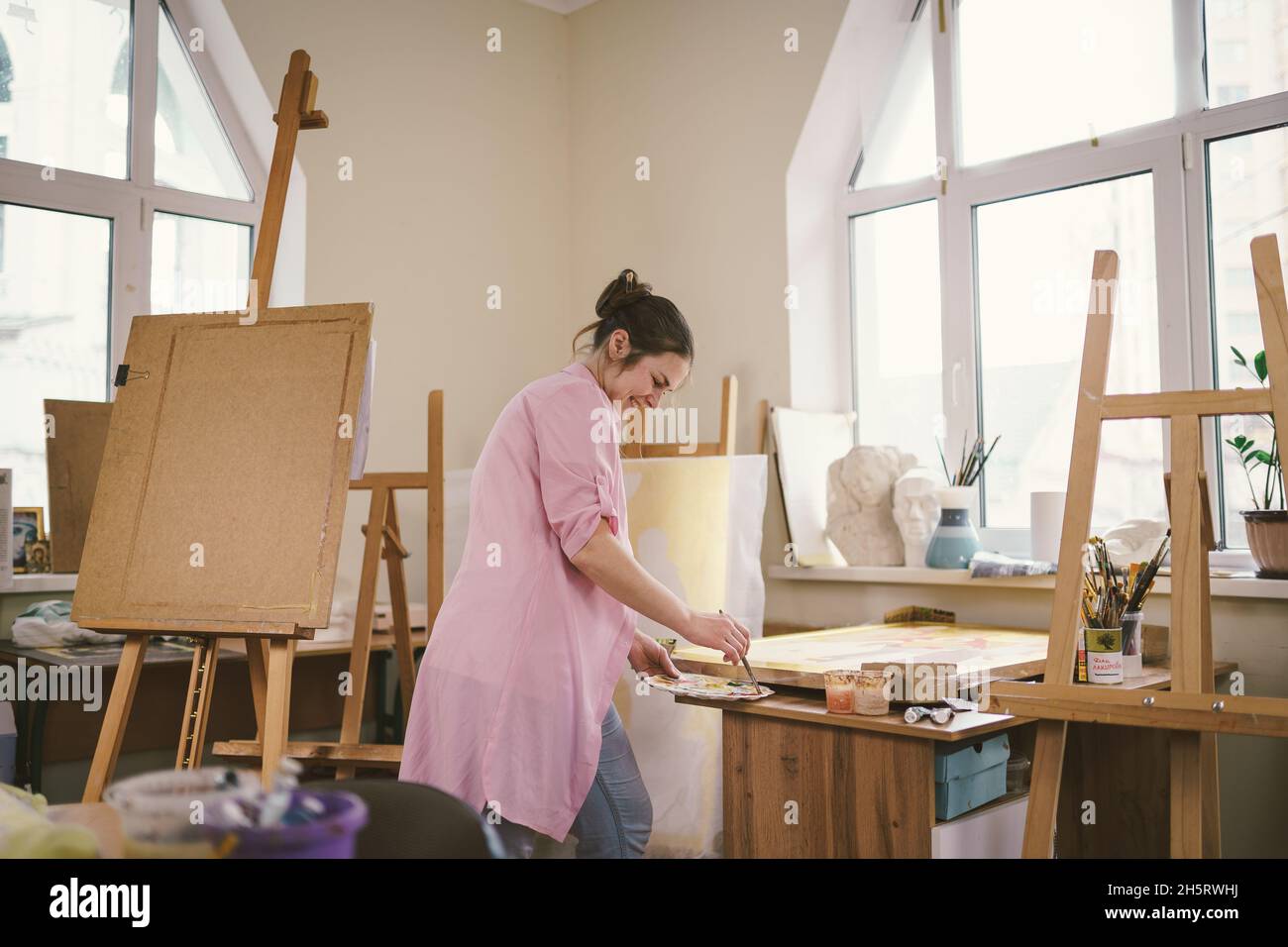 Art, creativity, hobby and creative occupation concept. Bringing ...