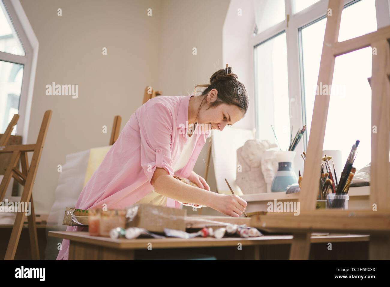 Art, creativity, hobby and creative occupation concept. Bringing ...