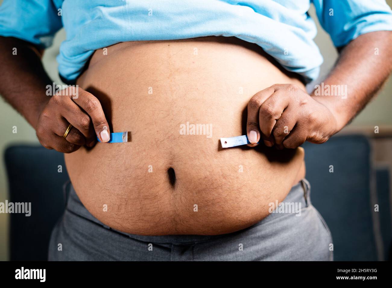 Big stomach hi-res stock photography and images - Alamy