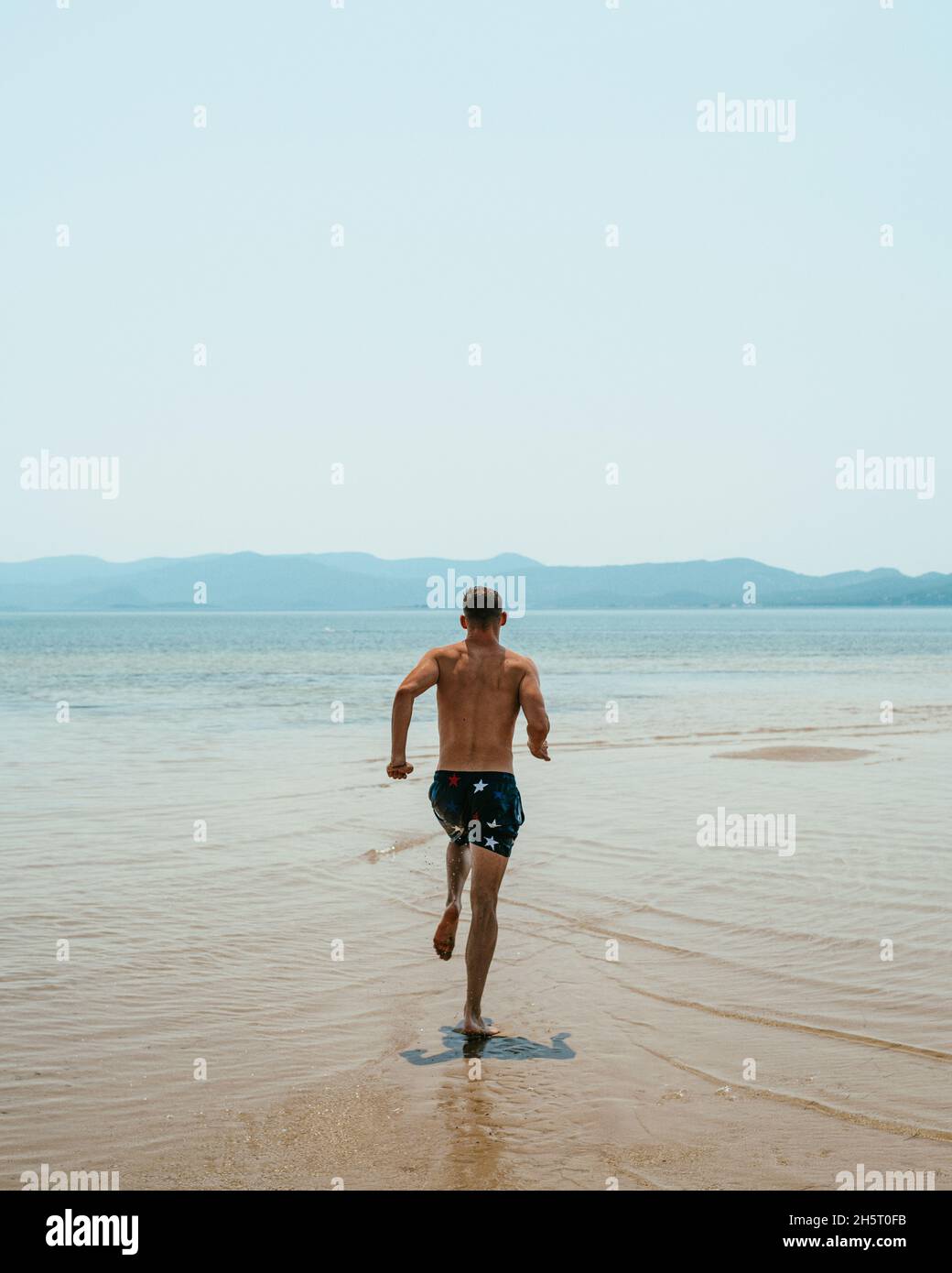 Barefoot running hi-res stock photography and images - Alamy