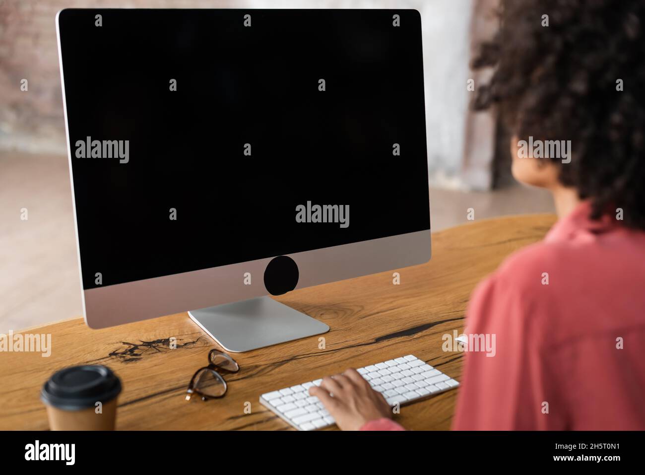 Woman typing computer back view hi-res stock photography and images - Alamy