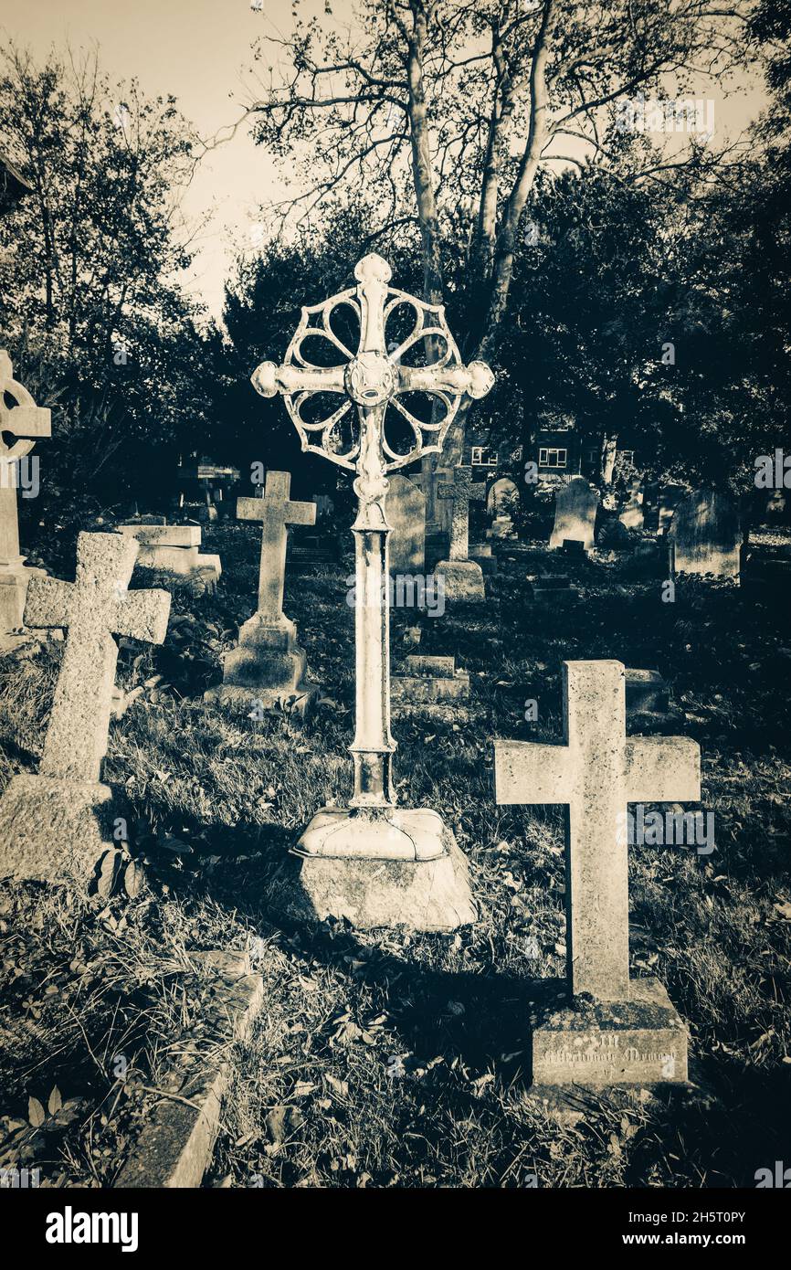 Strange looking grave in a mono split tone Stock Photo - Alamy