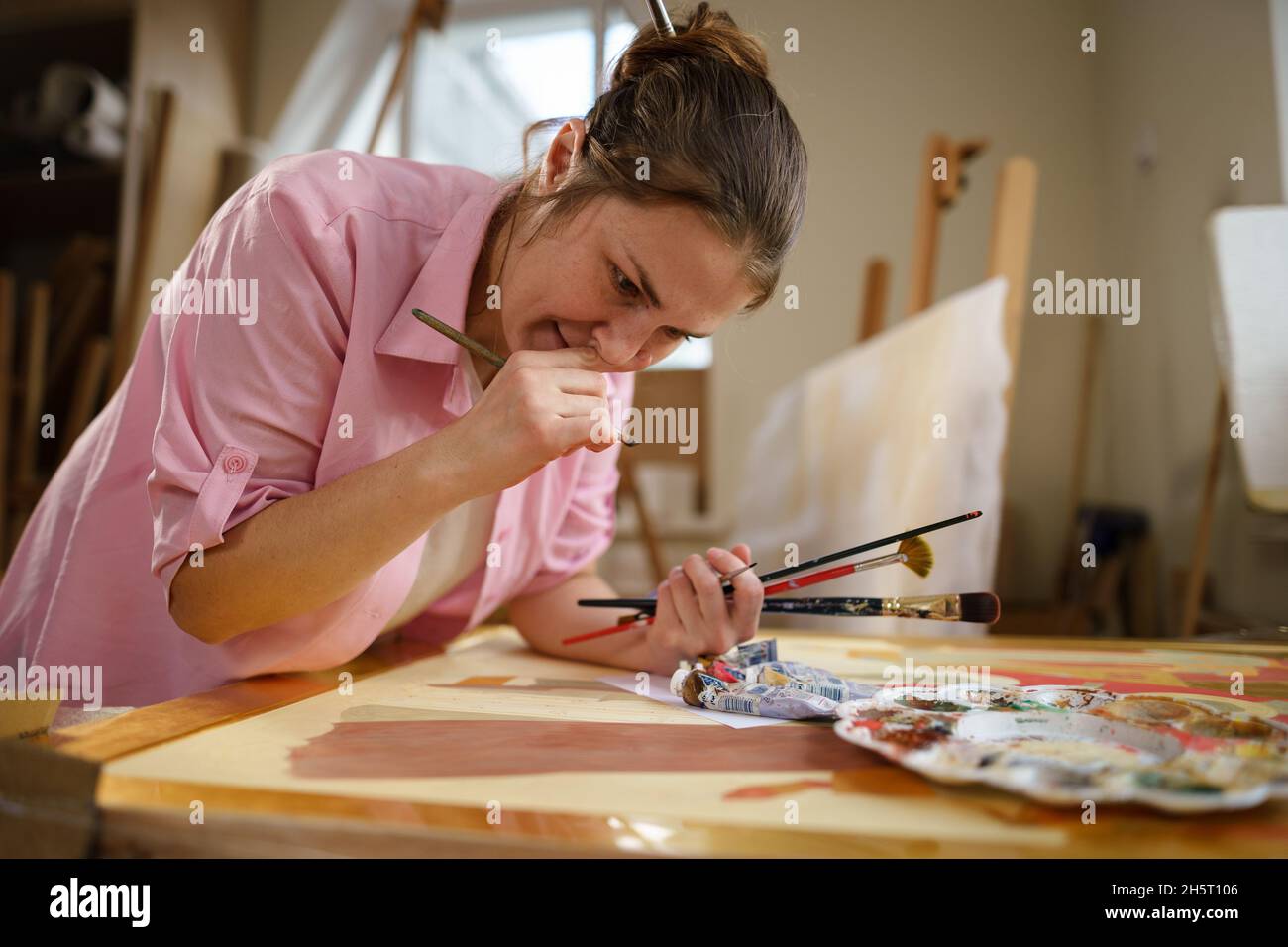 Art, creativity, hobby and creative occupation concept. Bringing ...