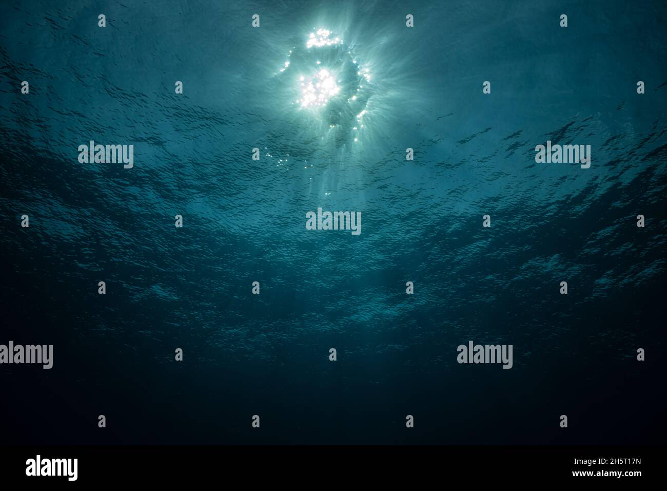 Beautiful sun with sunrays from deep of blue ocean looks majestic Stock ...
