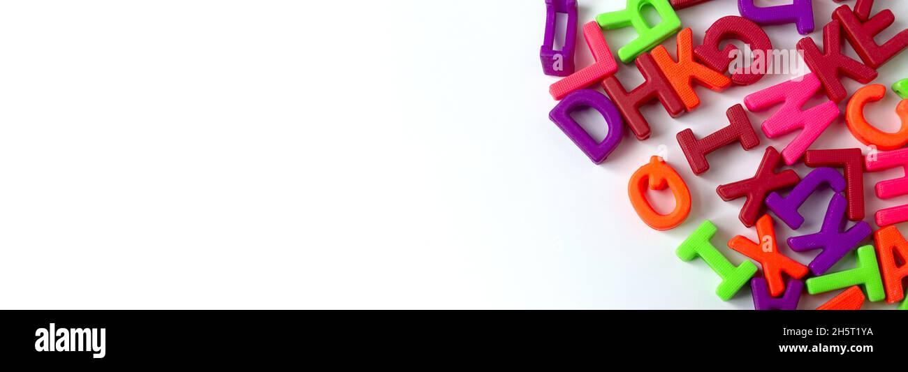 Wooden colored letters on a white background in various places. Copy ...