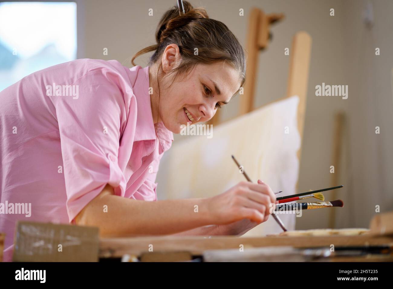 Art, creativity, hobby and creative occupation concept. Bringing ...