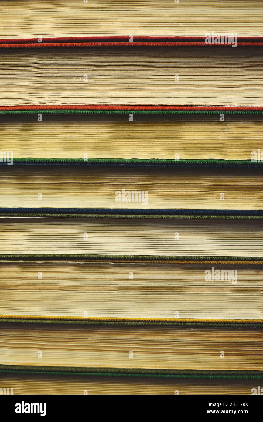 Background,stack of old books with yellowed pages Stock Photo - Alamy