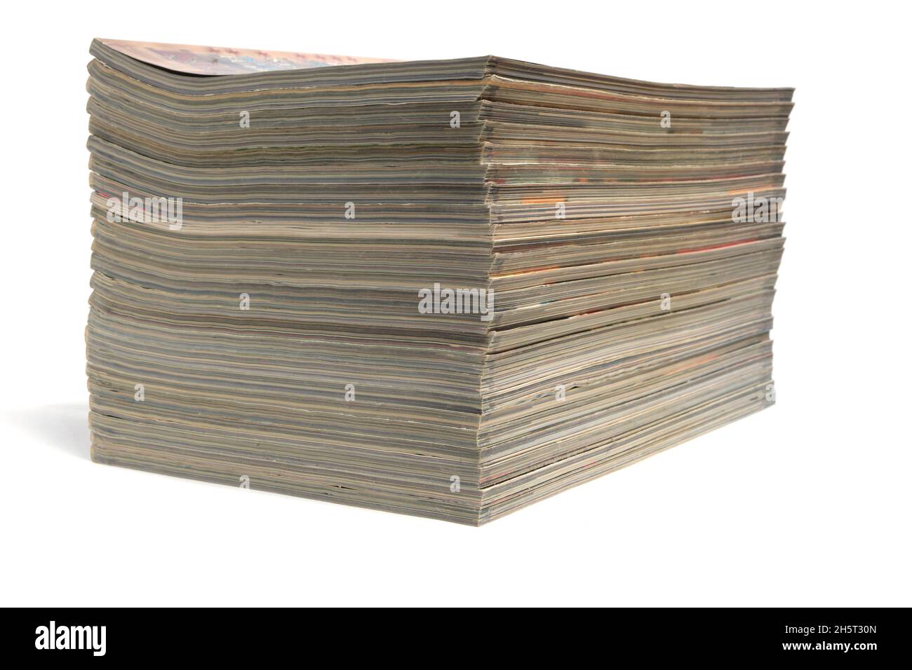 Stack of magazines and newspapers on a white background Stock Photo - Alamy