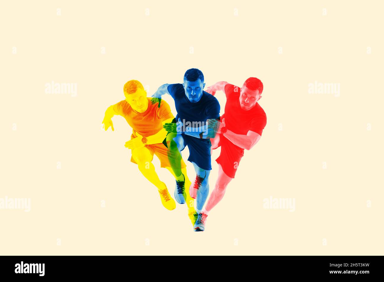 Portrait of professional male athlete, runner isolated on light ...