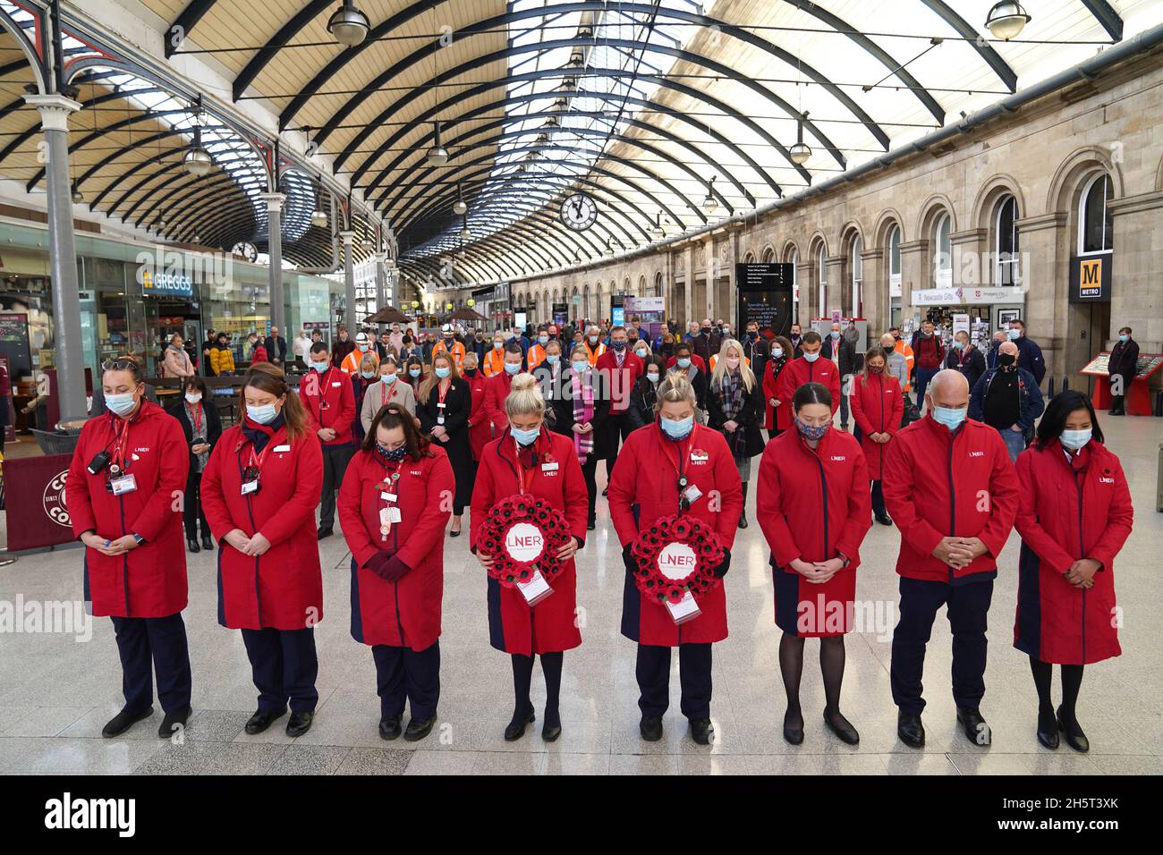 EDITORIAL USE ONLY Staff from LNER participate in the two minute ...