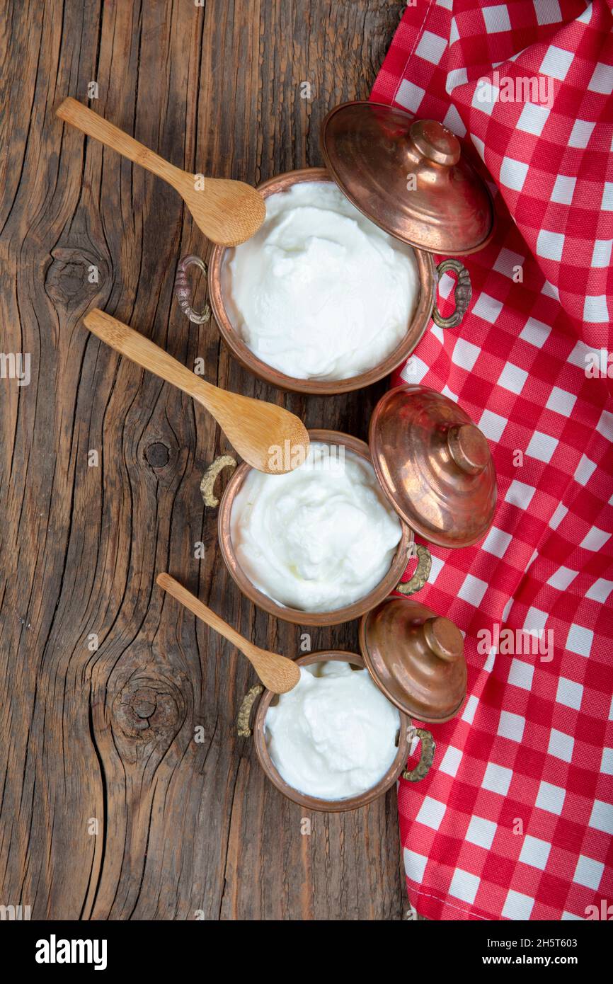 Water buffalo yogurt fermented in copper bowl. Homemade Yogurt in bowl ...