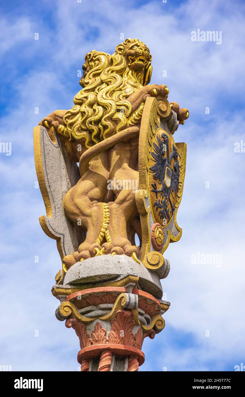 Ulm, Baden-Württemberg, Germany: Stone sculpture of two heraldic ...