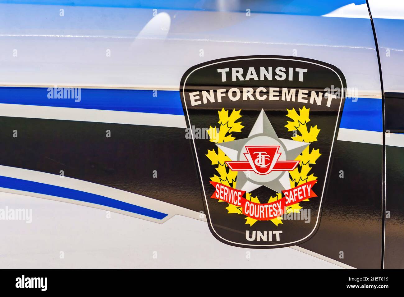 TTC Transit Enforcement Unit sign on the door of a patrol car seen in ...