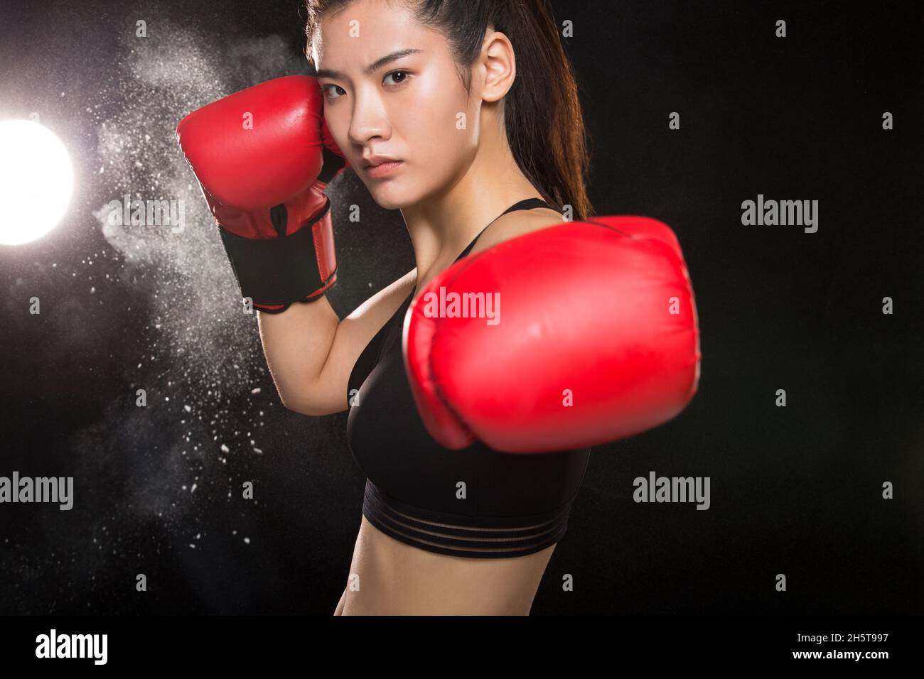 Young and beautiful female boxer Stock Photo - Alamy