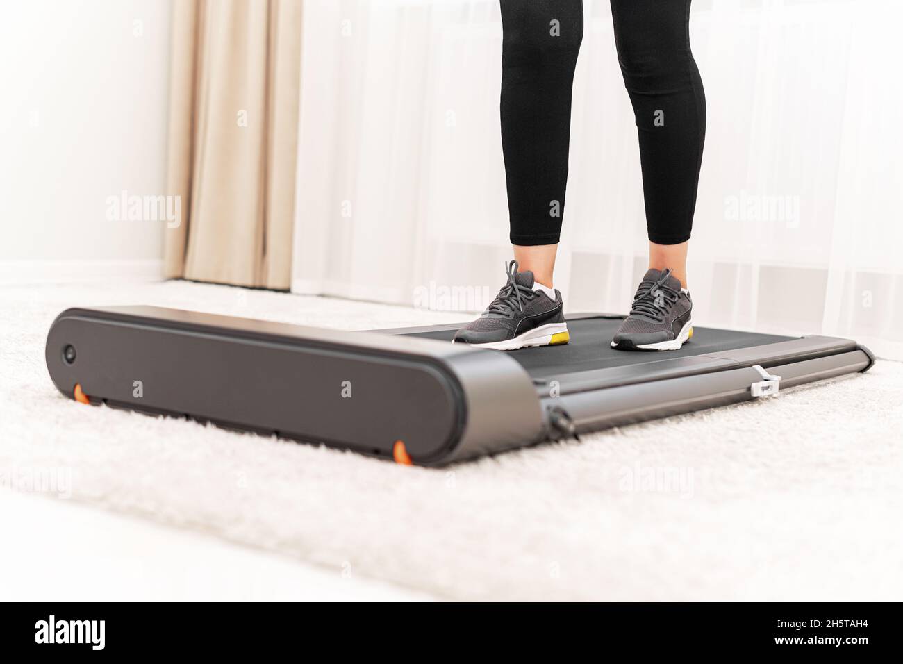 Woman legs run on treadmill hi-res stock photography and images - Alamy