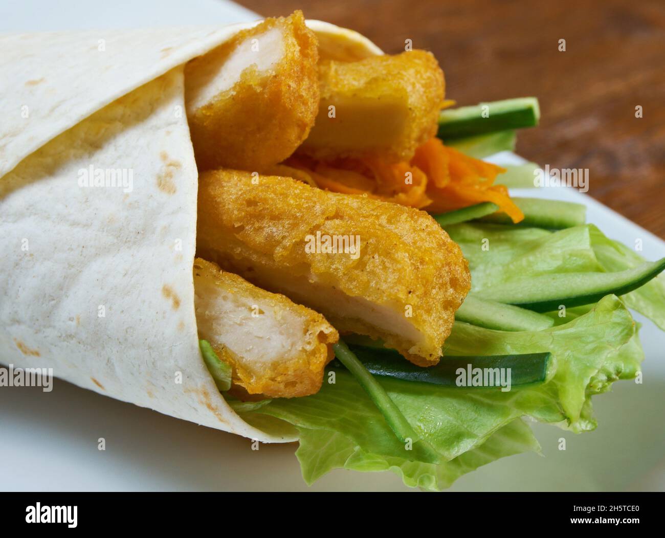 Greek-Style Chicken Wraps. chicken sandwich Stock Photo - Alamy
