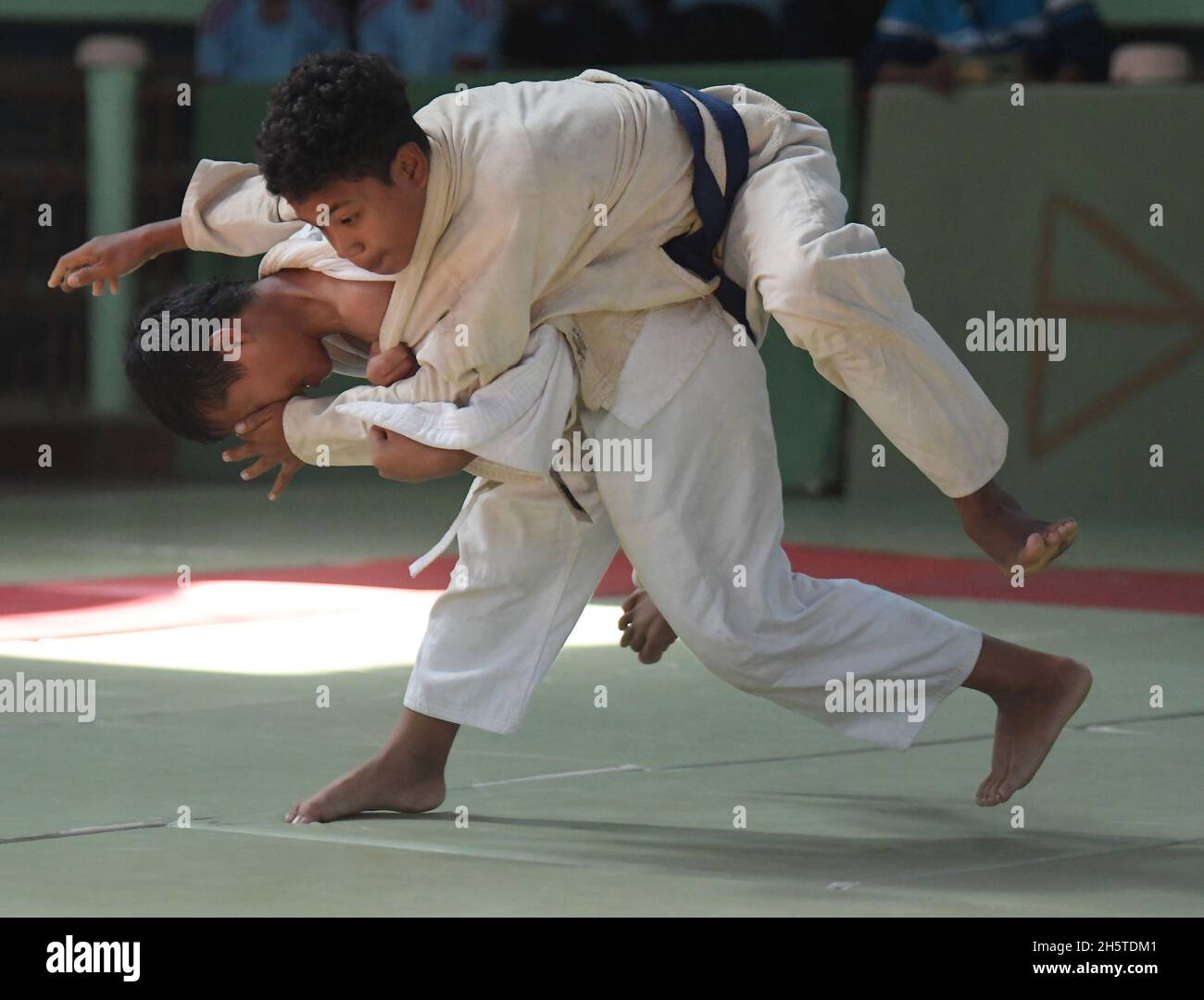 Students of Tripura sports school participate in a Judo competition at ...