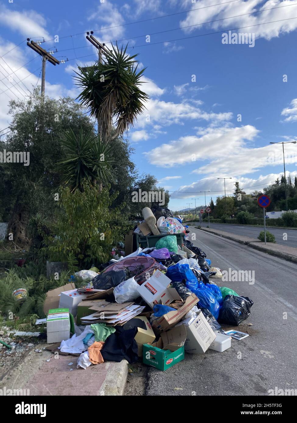 CORFU, GREECE - Oct 16, 2021: A vertical shot of a pile of rubbish and ...