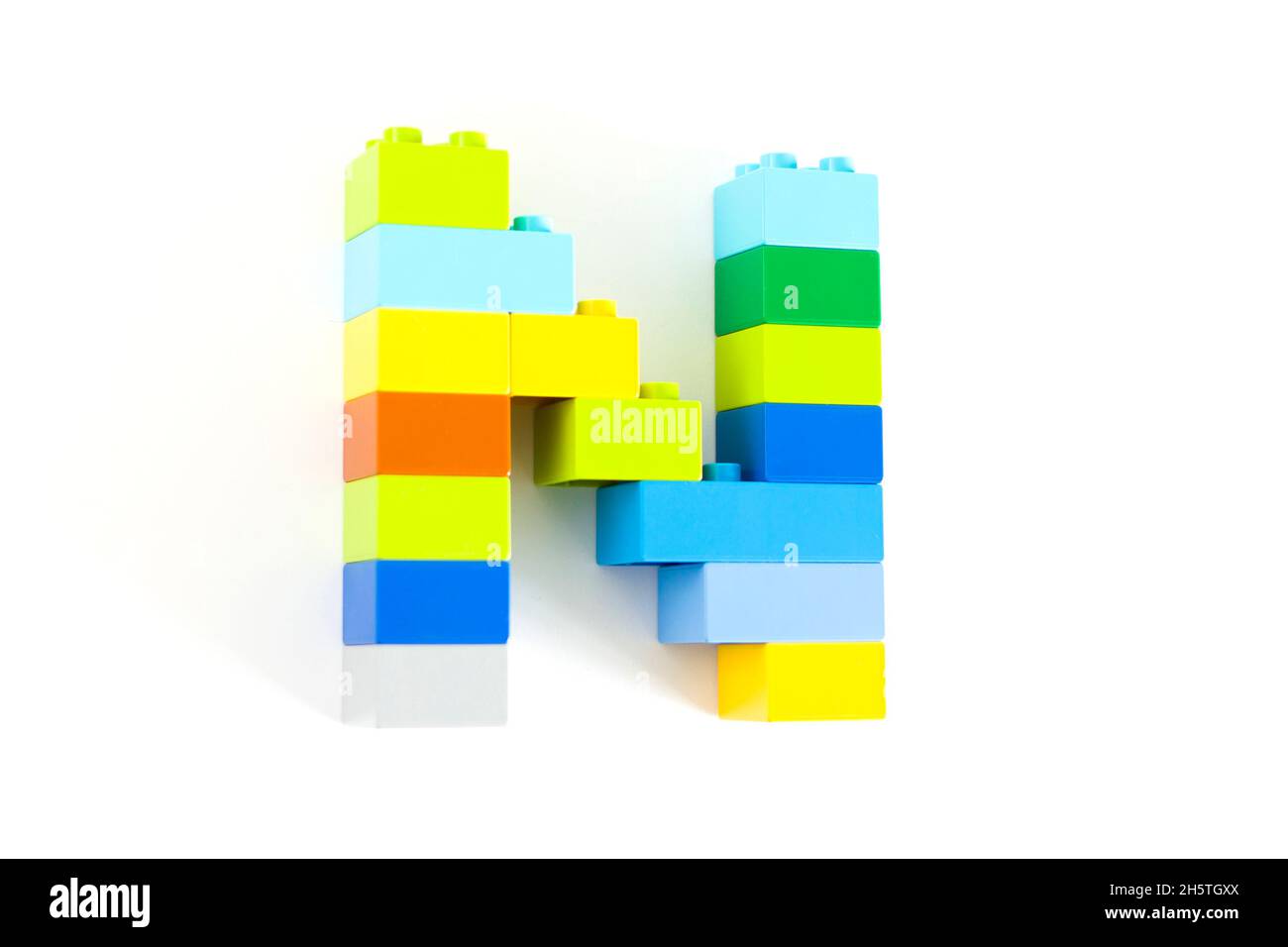 Colorful toy brick letter N isolated on the white background Stock ...