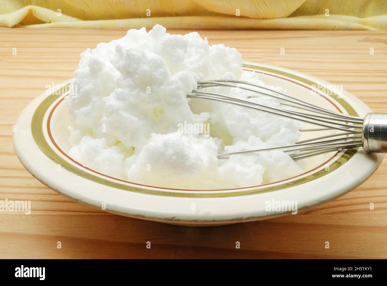 Plate of egg whites whipped into a large foam Stock Photo - Alamy