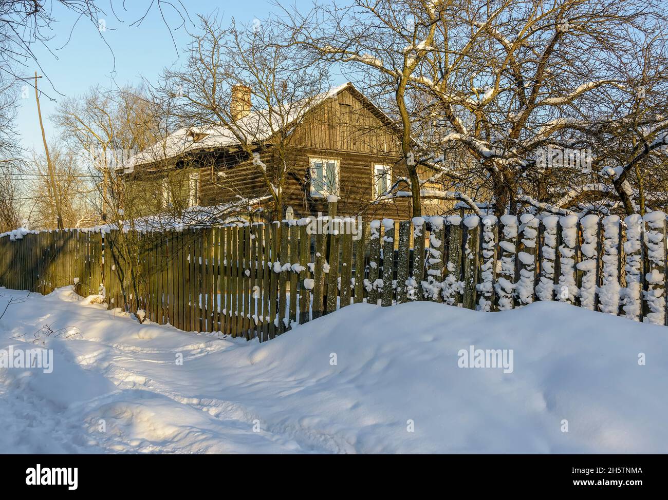 Remains of old wooden houses in the village of Ust-Slavyanka in the area of the construction of ...
