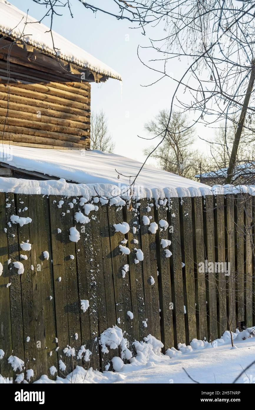 Remains of old wooden houses in the village of Ust-Slavyanka in the area of the construction of ...