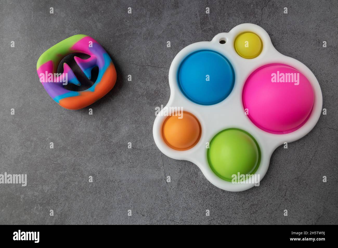 Two fidget toys anti-stress toys Stock Photo - Alamy