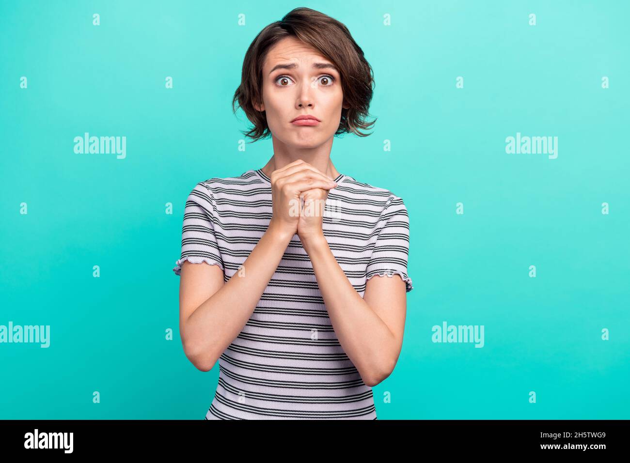Photo of young girl hands together ask beg wish please help wait expect ...