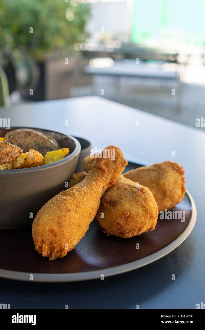 Traditional "leteci zganci" deep-fried chicken with potato in Ljubljana ...