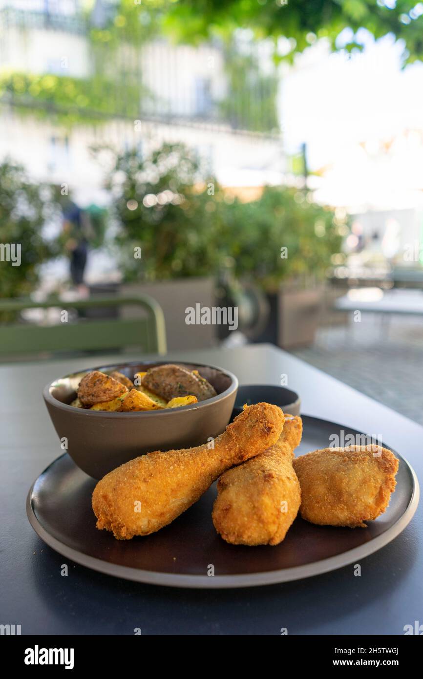 Traditional "leteci zganci" deep-fried chicken with potato in Ljubljana ...