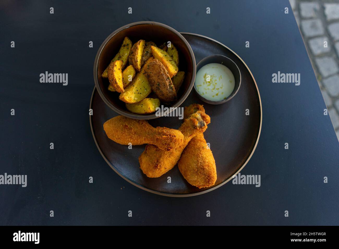 Traditional "leteci zganci" deep-fried chicken with potato in Ljubljana ...