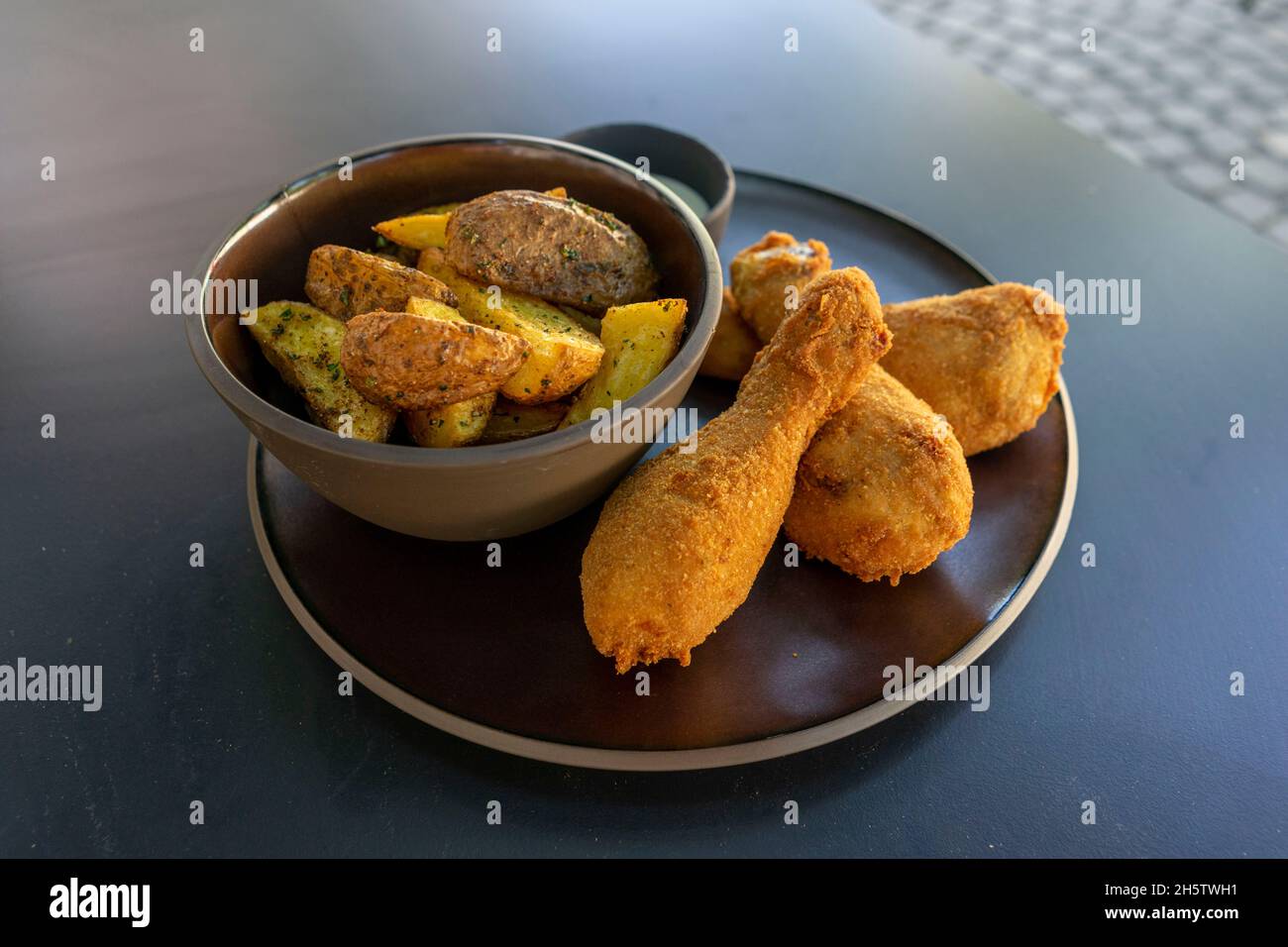 Traditional "leteci zganci" deep-fried chicken with potato in Ljubljana ...