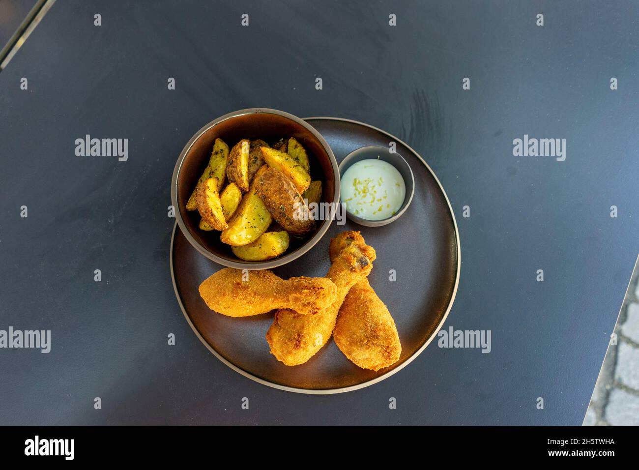 Traditional "leteci zganci" deep-fried chicken with potato in Ljubljana ...