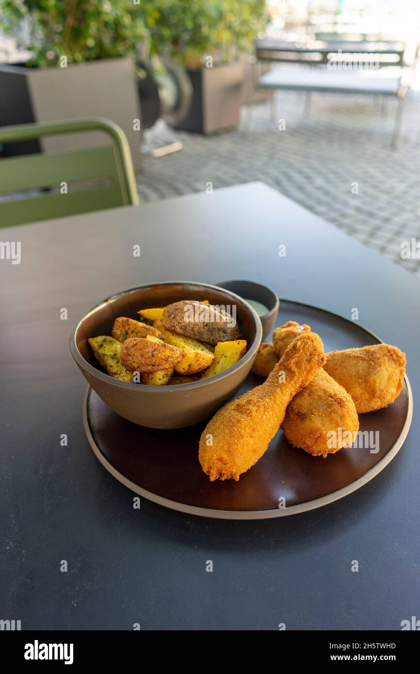 Traditional "leteci zganci" deep-fried chicken with potato in Ljubljana ...