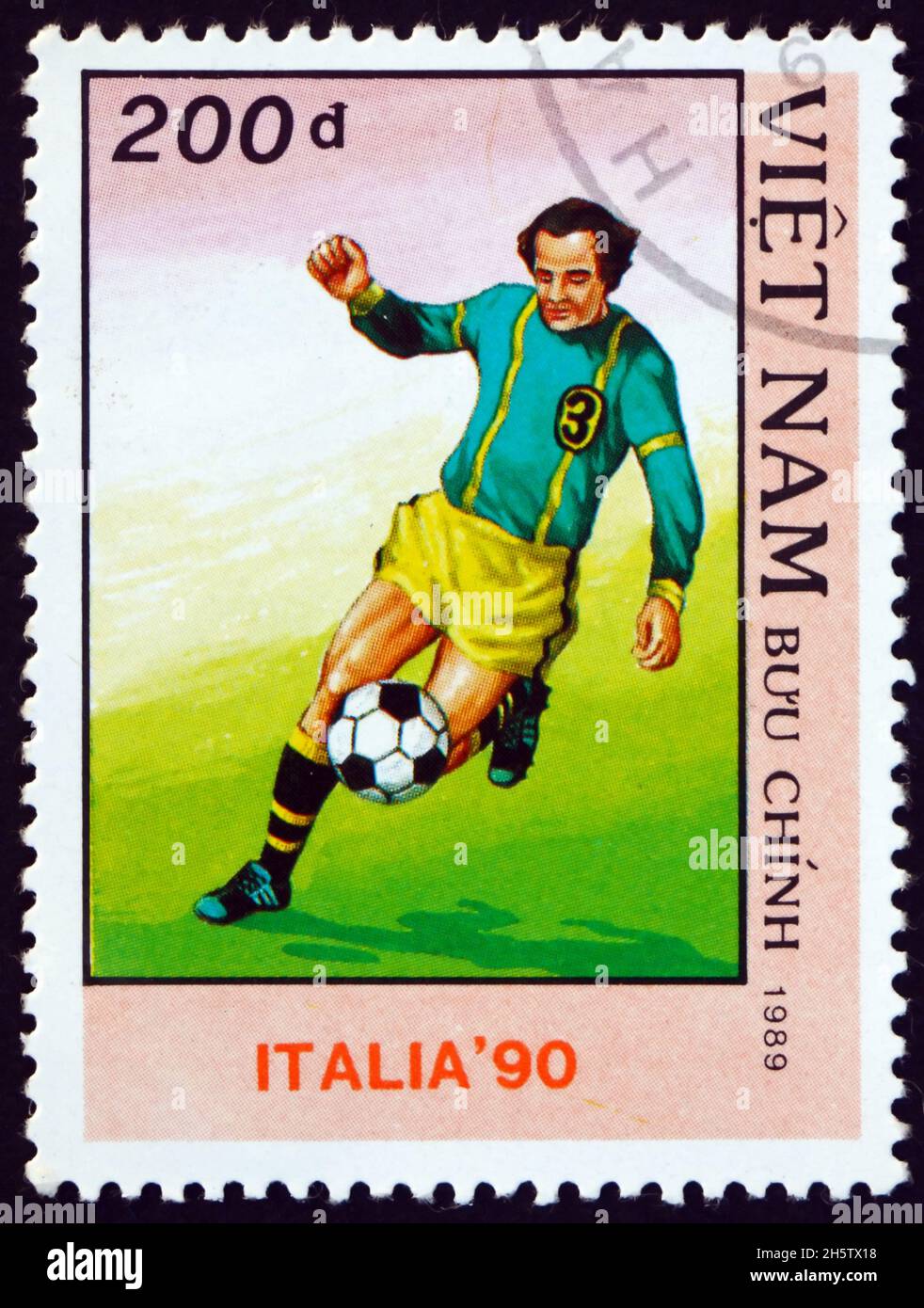 VIETNAM - CIRCA 1989: a stamp printed in Vietnam shows soccer player in ...