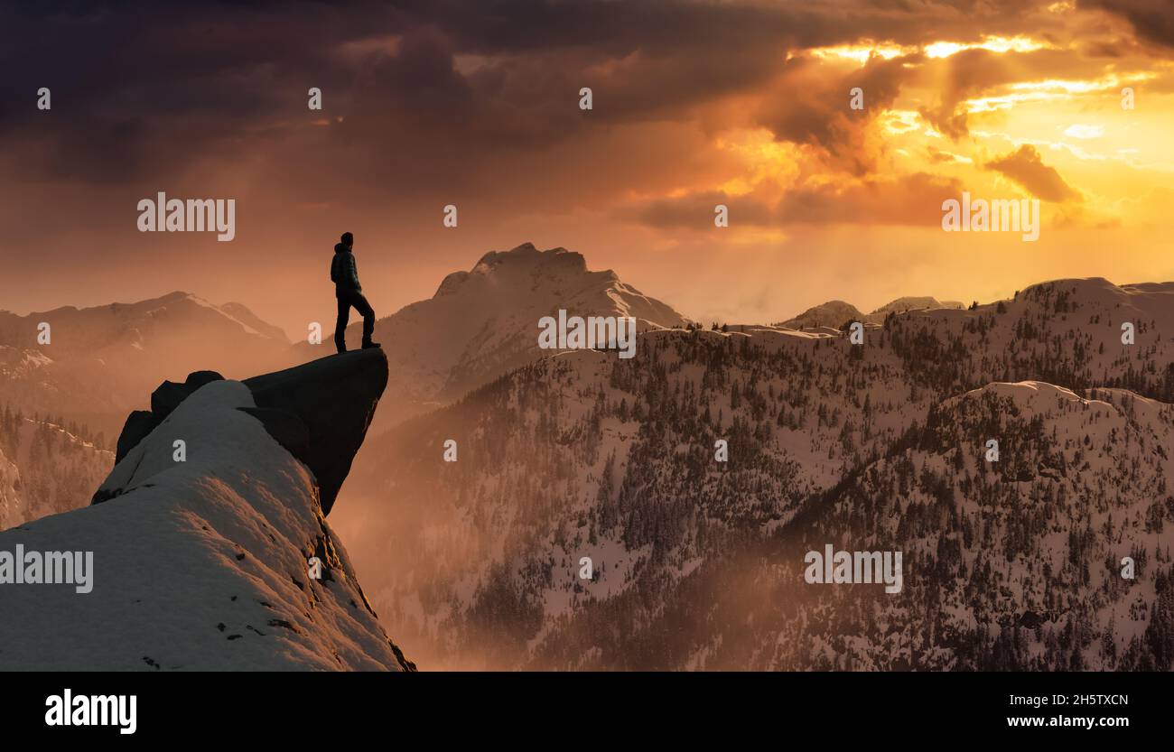 Extreme adventure composite. Man on top of a Rocky Mountain Cliff Stock ...