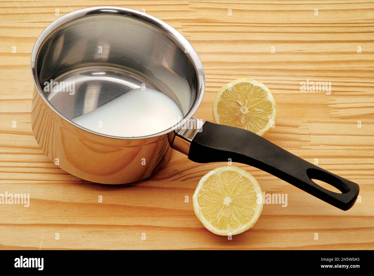 Ingredients of the tile recipe with rice, cream and lemon Stock Photo ...