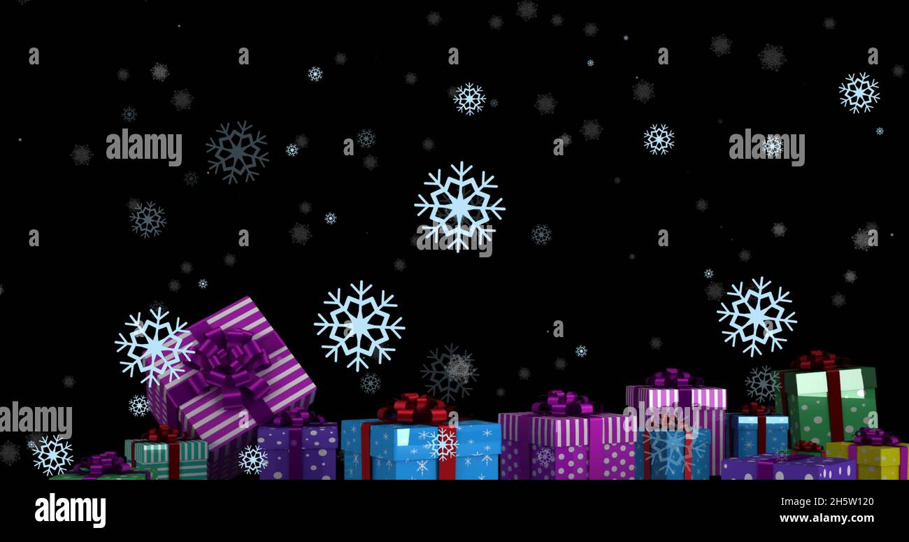 Image of snow falling over presents on black background and winter ...